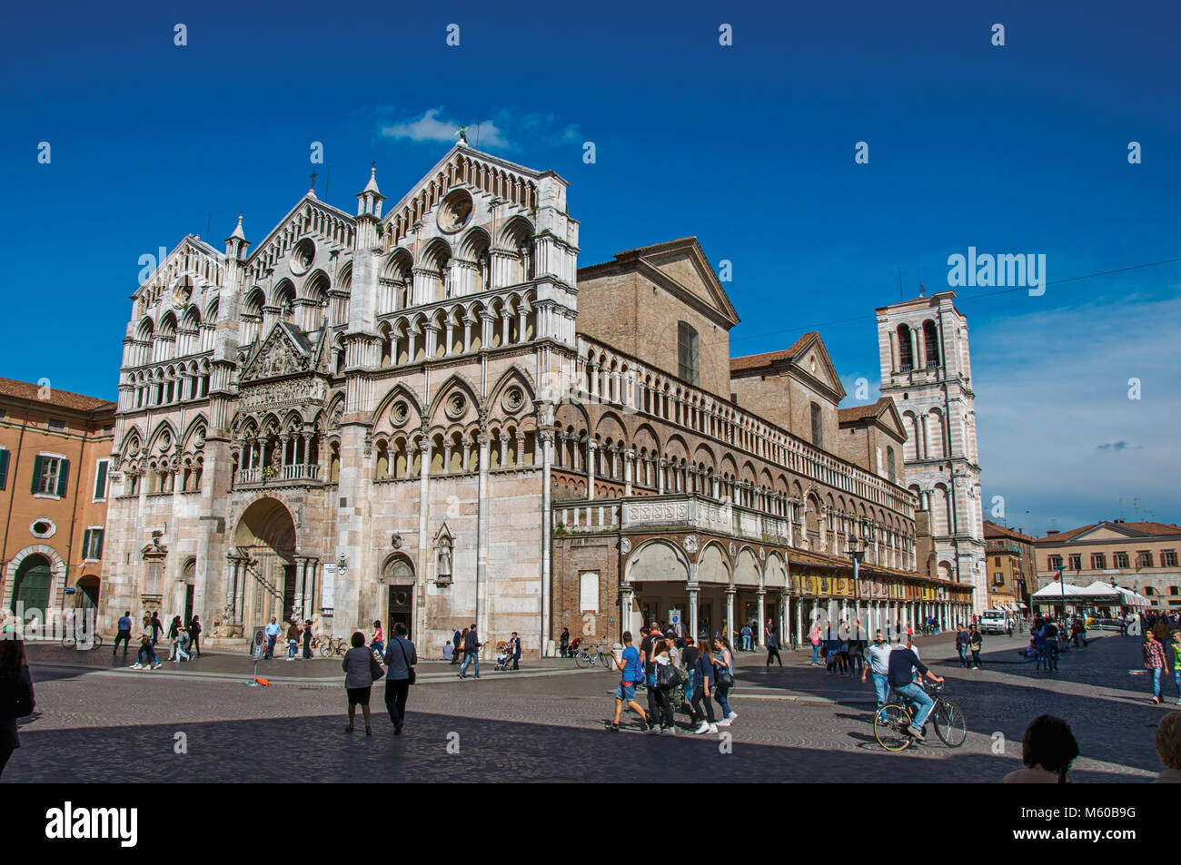 Ferrara, Italy. Front facade and belfry of Ferrara Cathedral, made in ...