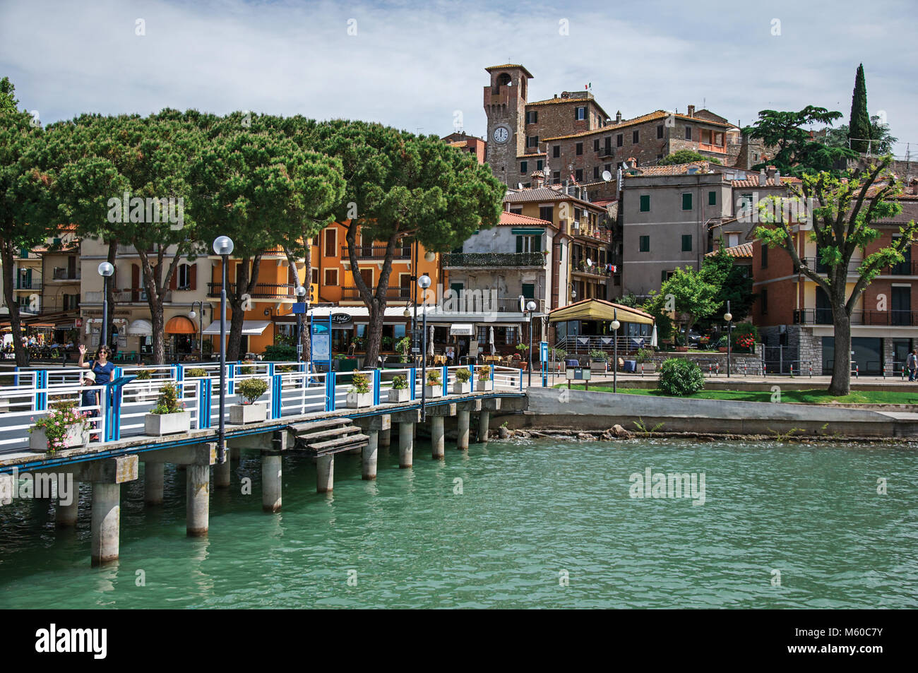 Passignano sul Trasimeno, Italy. View of the village and its harbor on ...