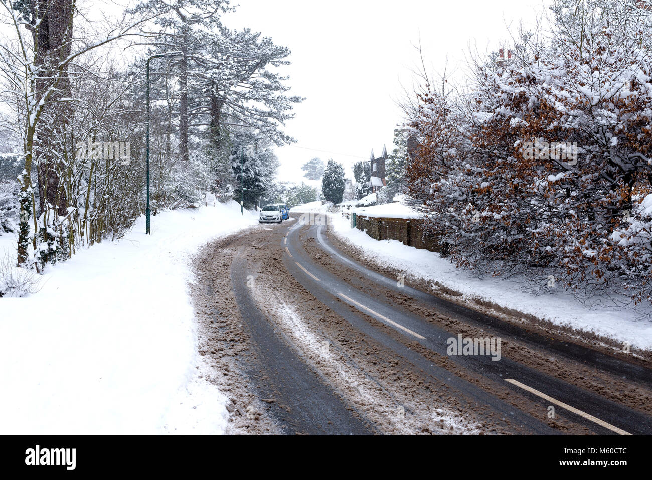 Road through Snow Stock Photo - Alamy