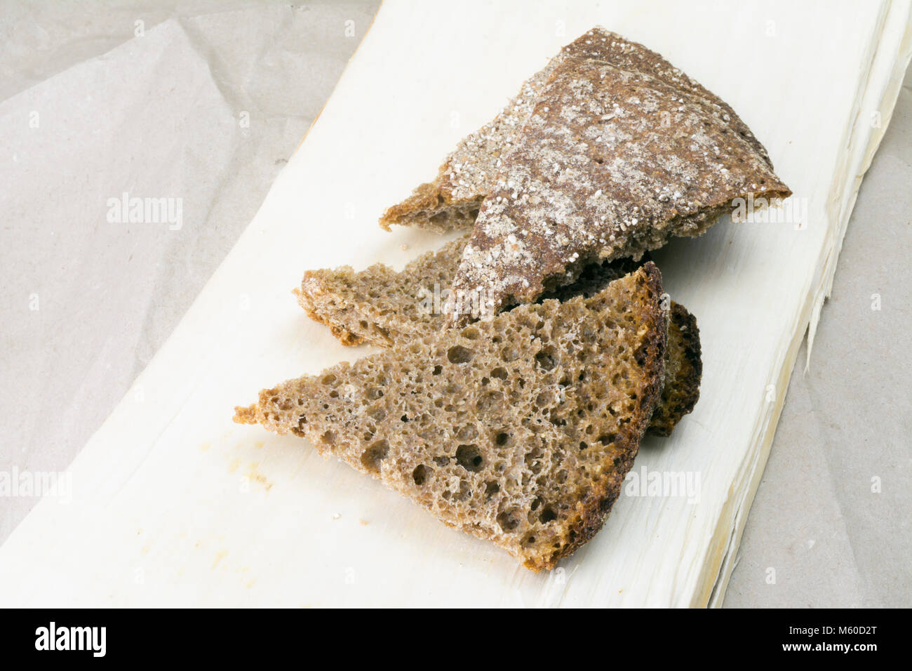 Traditional Finnish rye bread slices on wooden shingle Stock Photo - Alamy