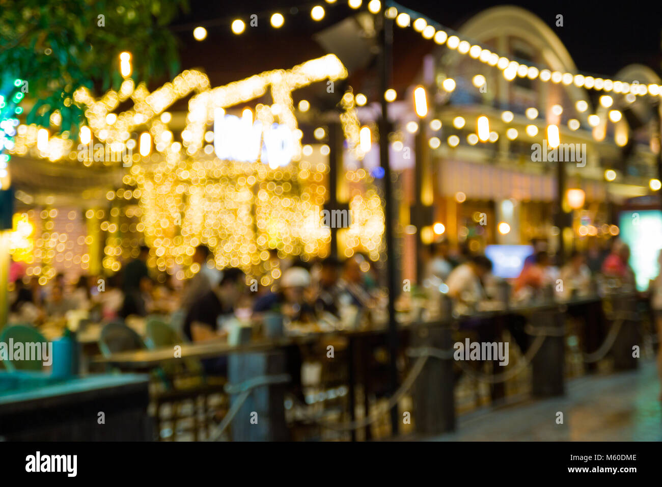 blurred image festivals and parties of the night in a restaurant and ...