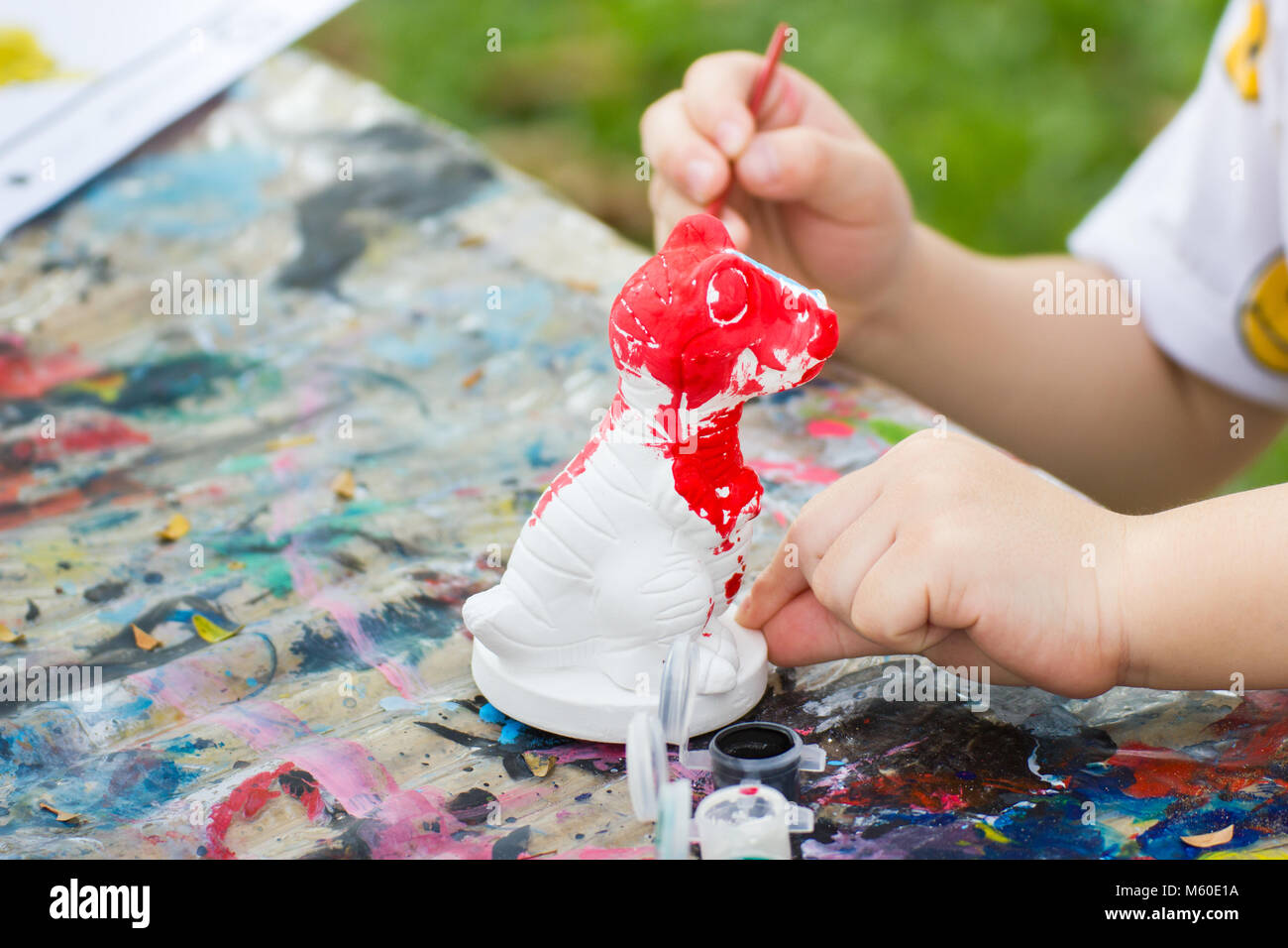 Hand of children painted watercolor on Plaster doll, Asia Bangkok of ...