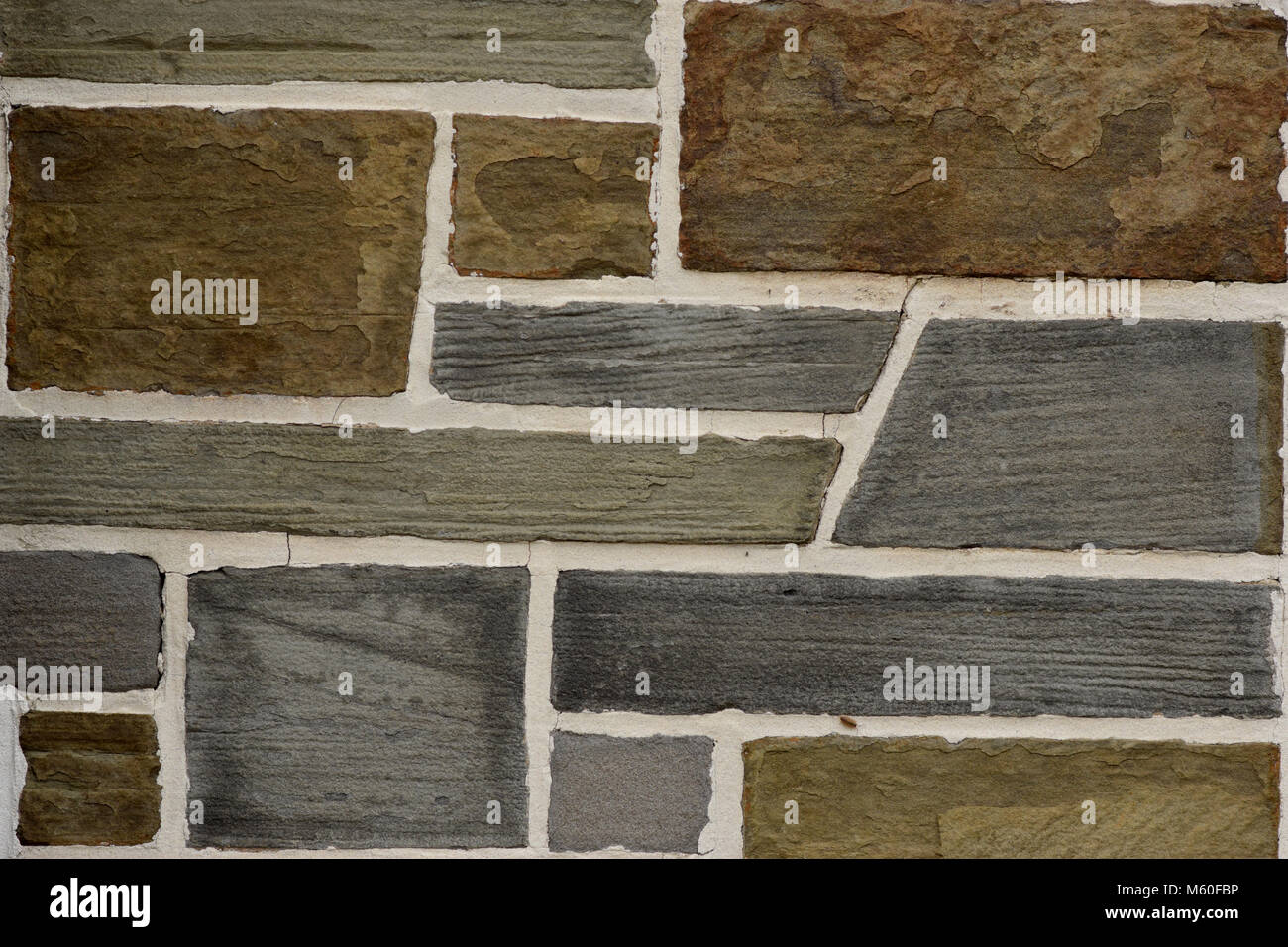 Closeup blue and brown shale cobblestone texture background Stock Photo ...