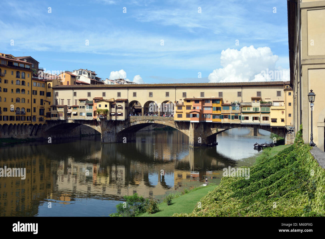 Ponte Vecchio bridge over the river Arno in Florence - Italy Stock ...