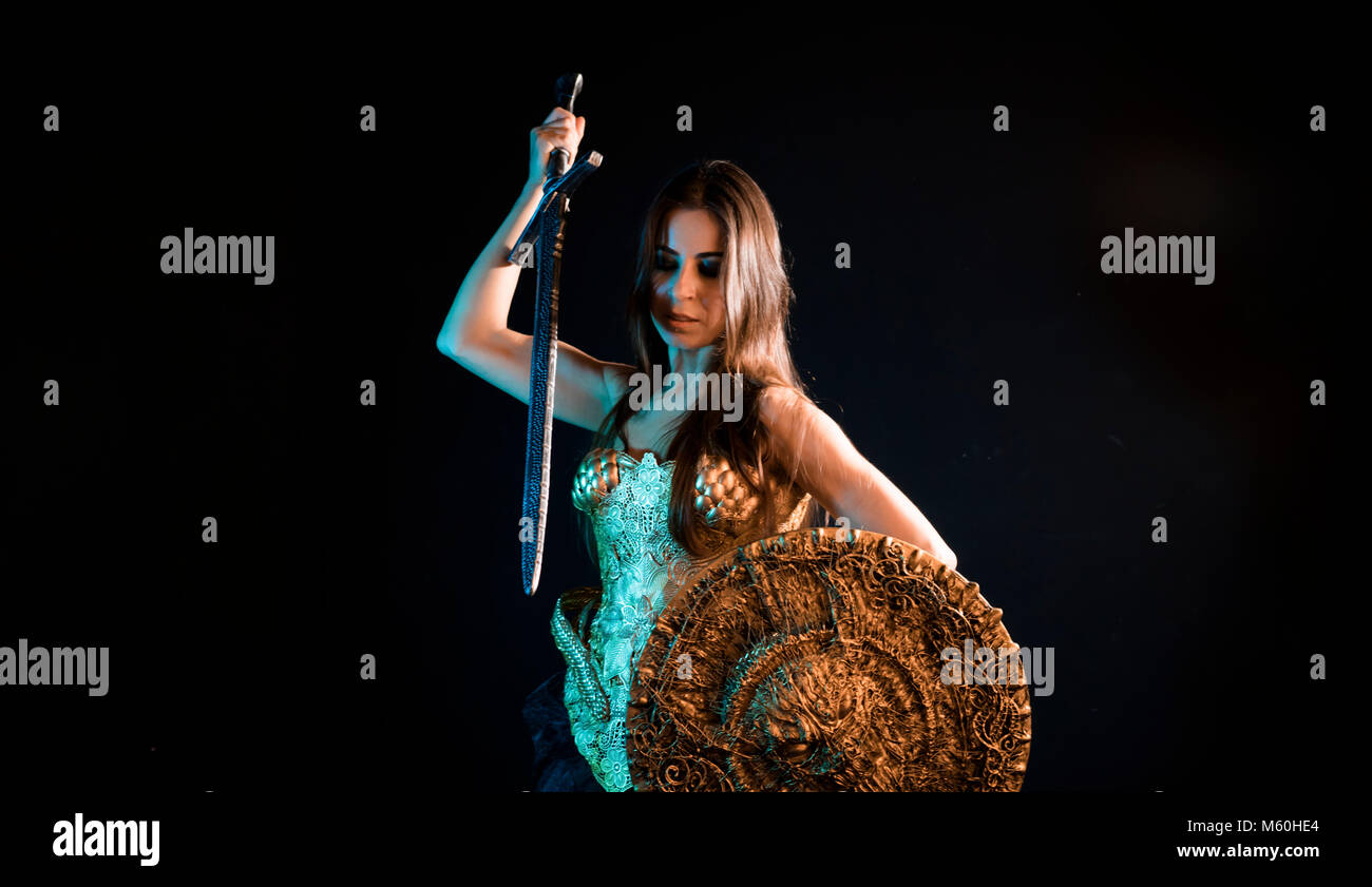 valkyrie warrior, woman with golden armor iron coat and big warrior ...