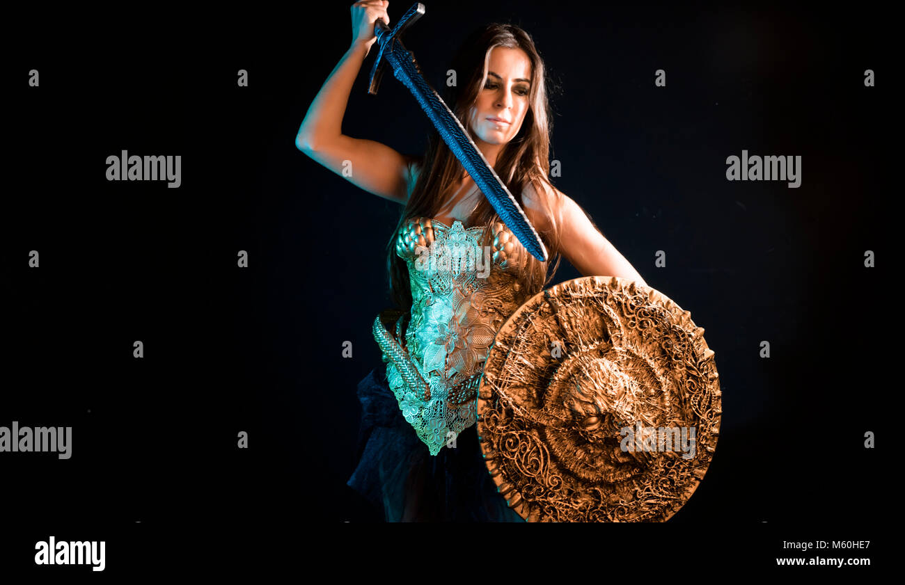 Knight valkyrie warrior, woman with golden armor iron coat and big ...