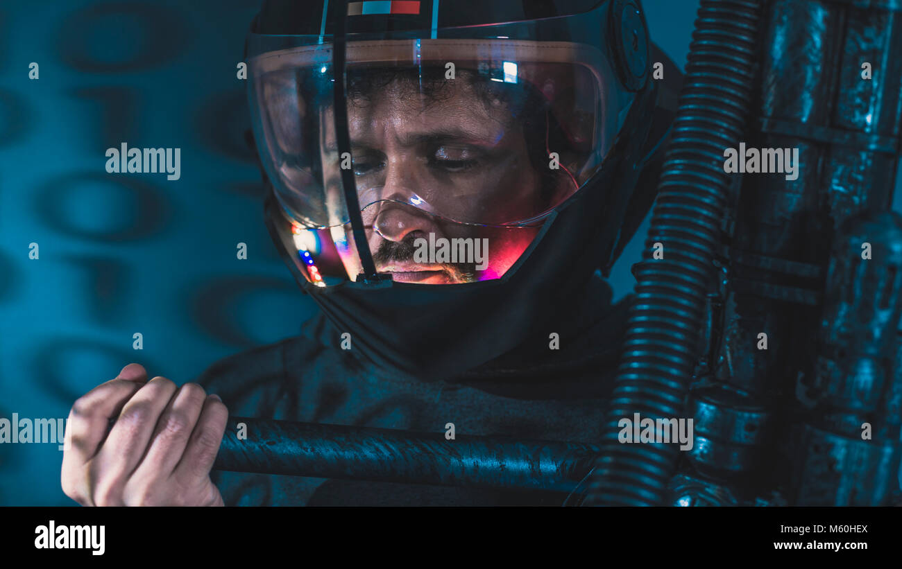 space man with led lights helmet, space suit and gun in the shape of a ...