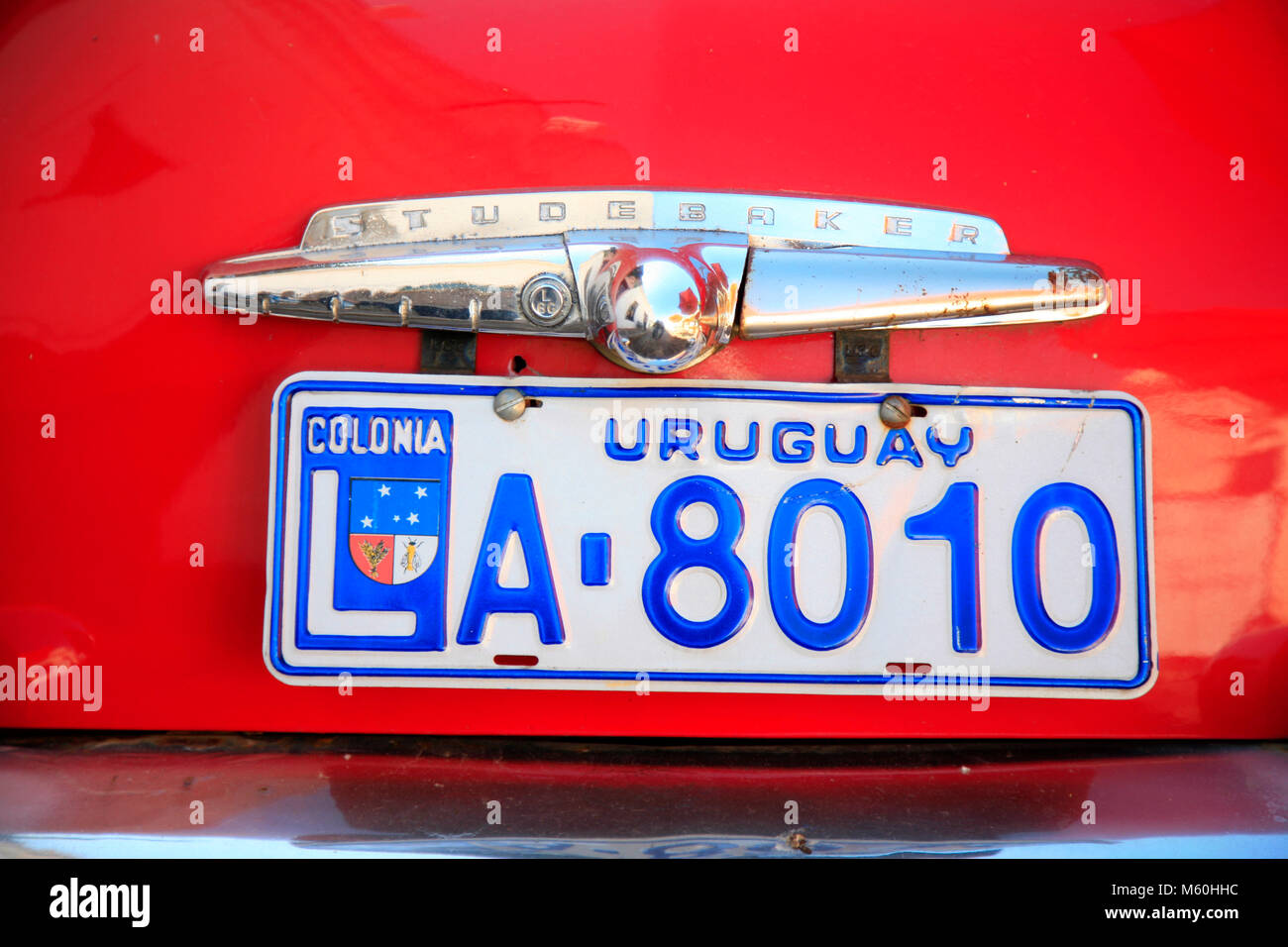 The license plate of a classic antique car is seen in the city of ...