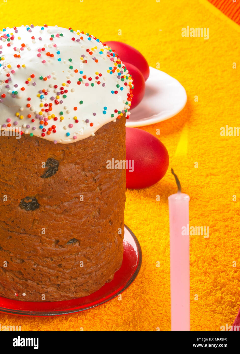 Kulichi, traditional Russian Easter cake with icing and dyed eggs Stock ...