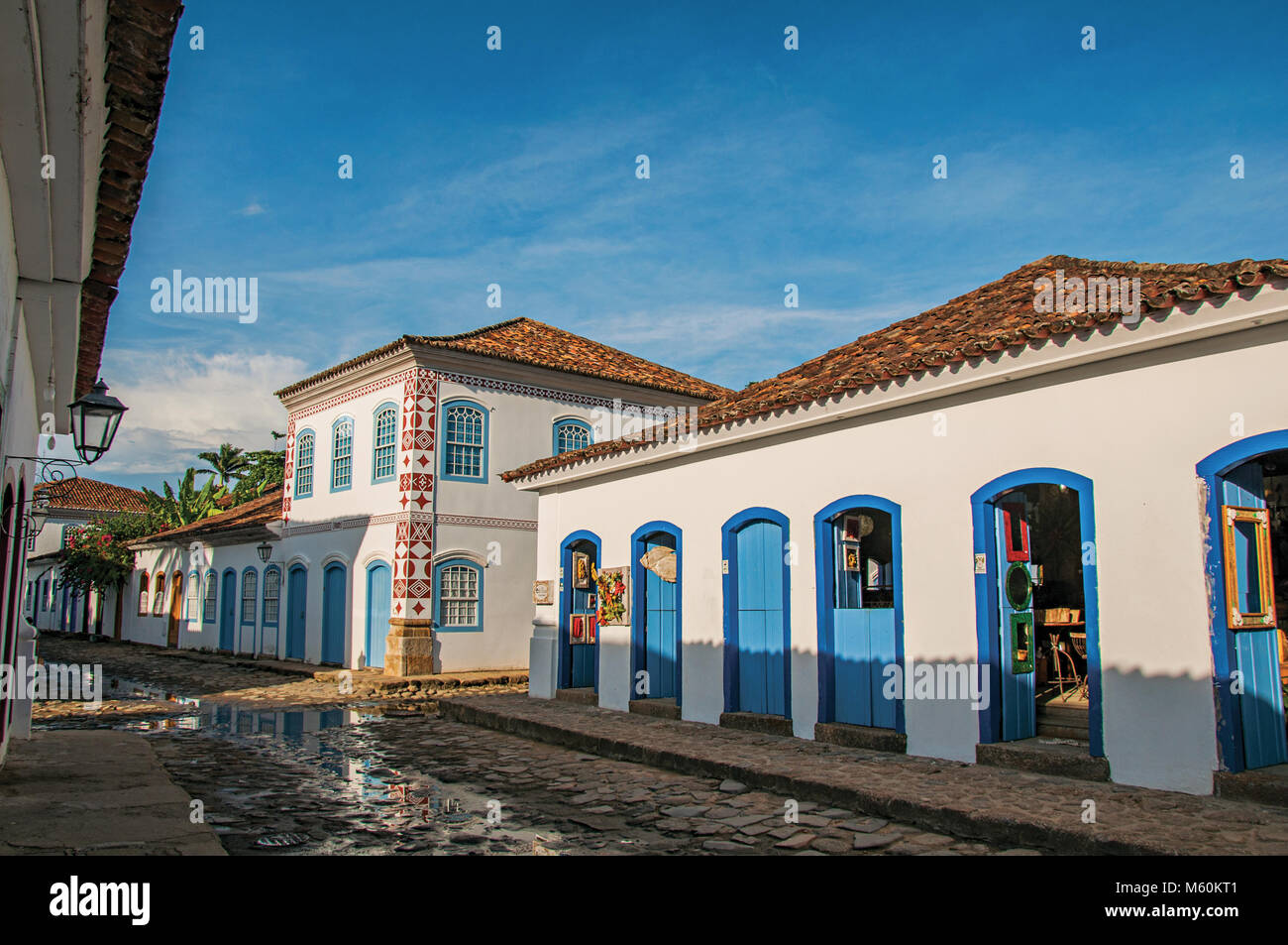 Paraty, Brazil. View of flooded cobblestone street with old houses at ...