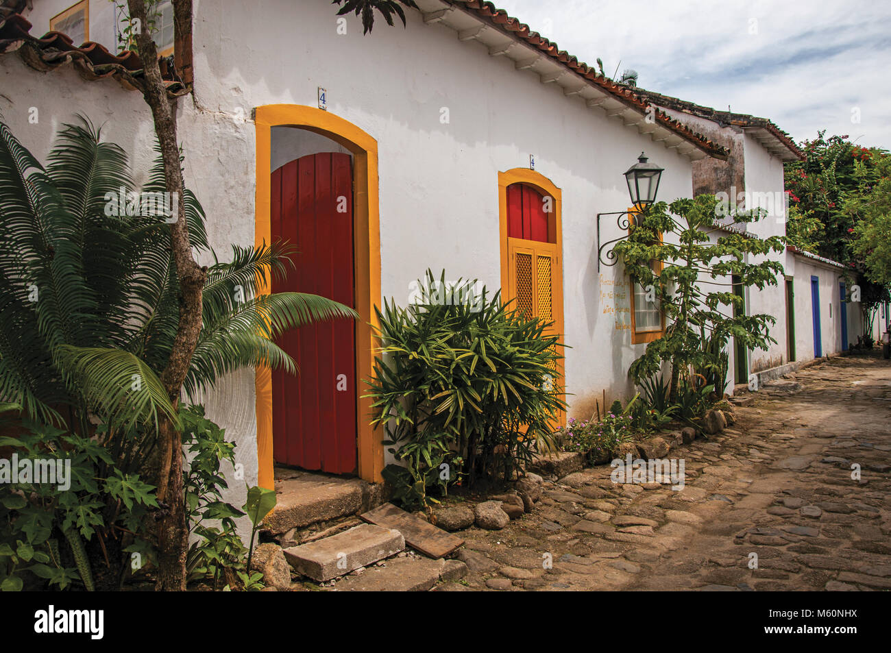 Paraty, Brazil. Cobblestone alley with old colorful houses and ...