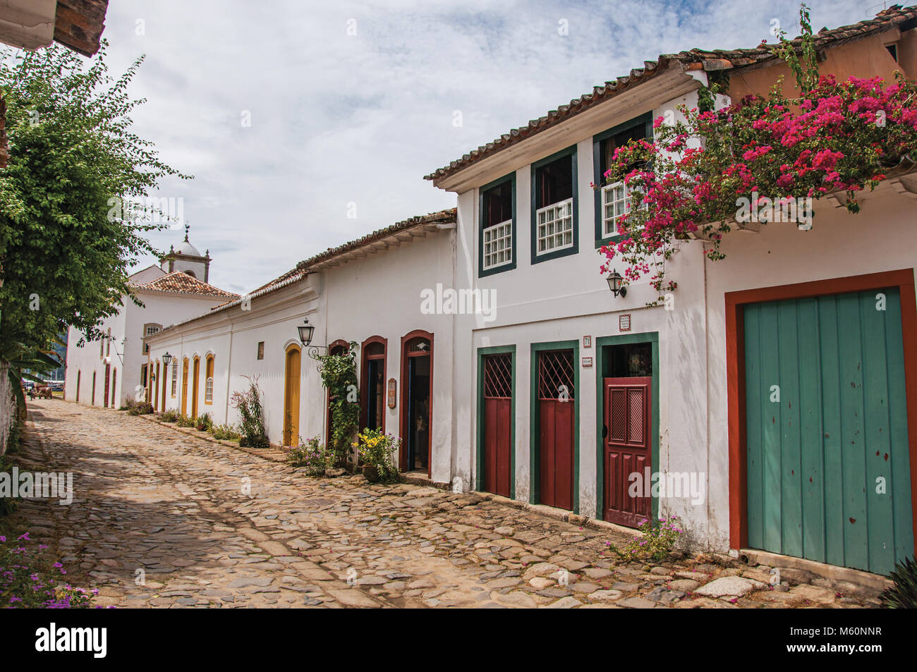 Paraty, Brazil. Cobblestone alley with old colorful houses and ...