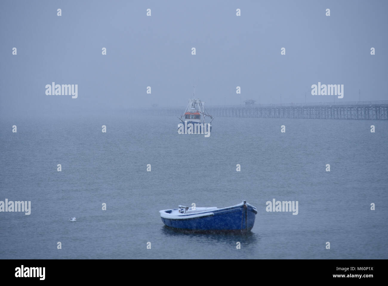 Southend Pier in a snow storm during the ‘Beast from the East’ weather ...