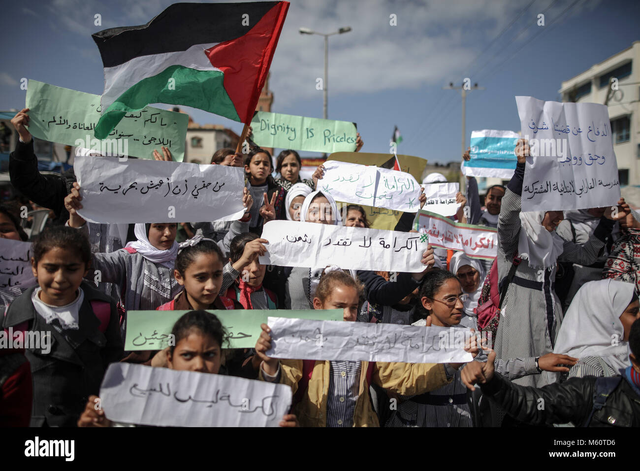 Palestinian students of United Nations-run schools take part in a ...