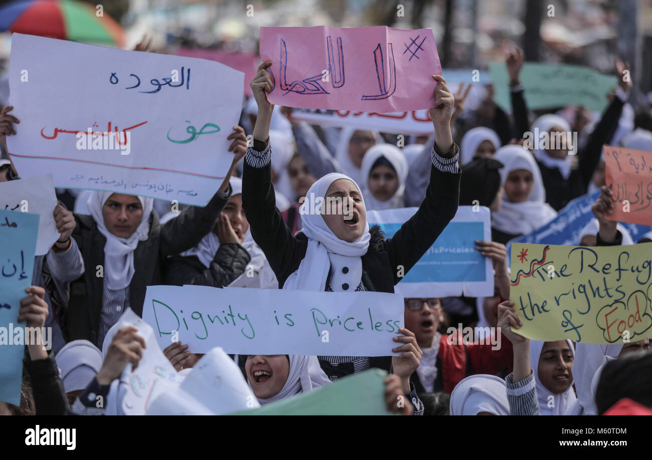 Palestinian students of United Nations-run schools take part in a ...