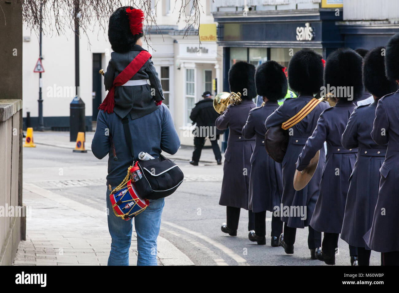 Windsor, UK. 27th February, 2018. A young boy in a guards' uniform ...