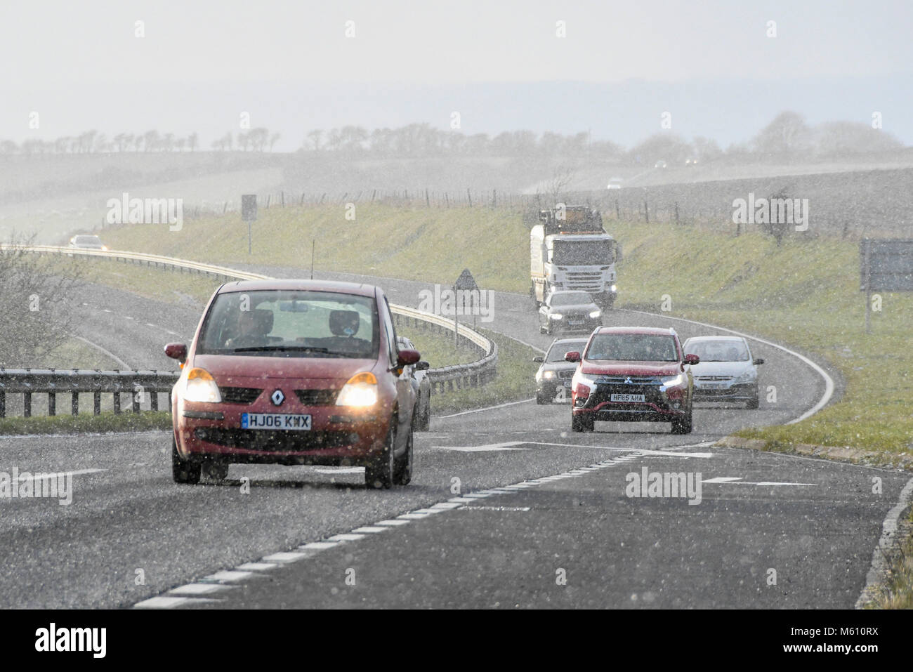 A35, Long Bredy, Dorset, UK. 27th February 2018. UK Weather. Cars ...