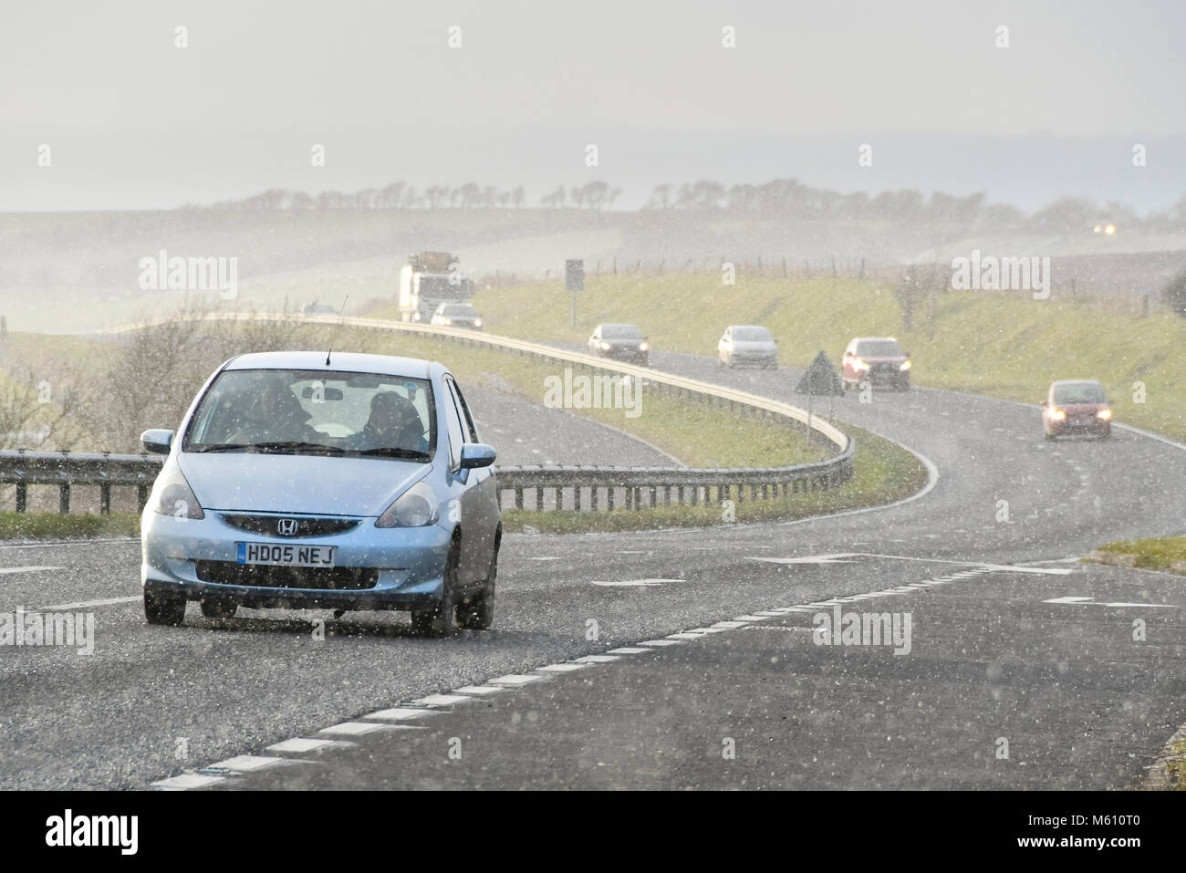 A35, Long Bredy, Dorset, UK. 27th February 2018. UK Weather. Cars ...