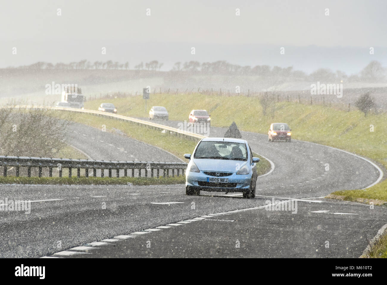 A35, Long Bredy, Dorset, UK. 27th February 2018. UK Weather. Cars ...