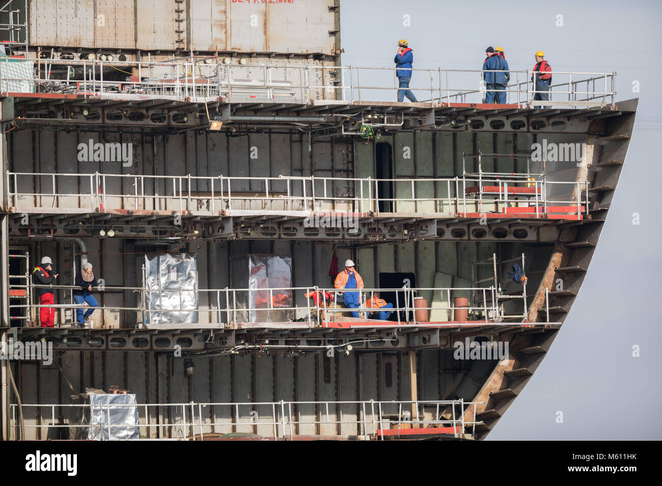 17 February 2018, Germany, Papenburg: Ship construction workers work ...