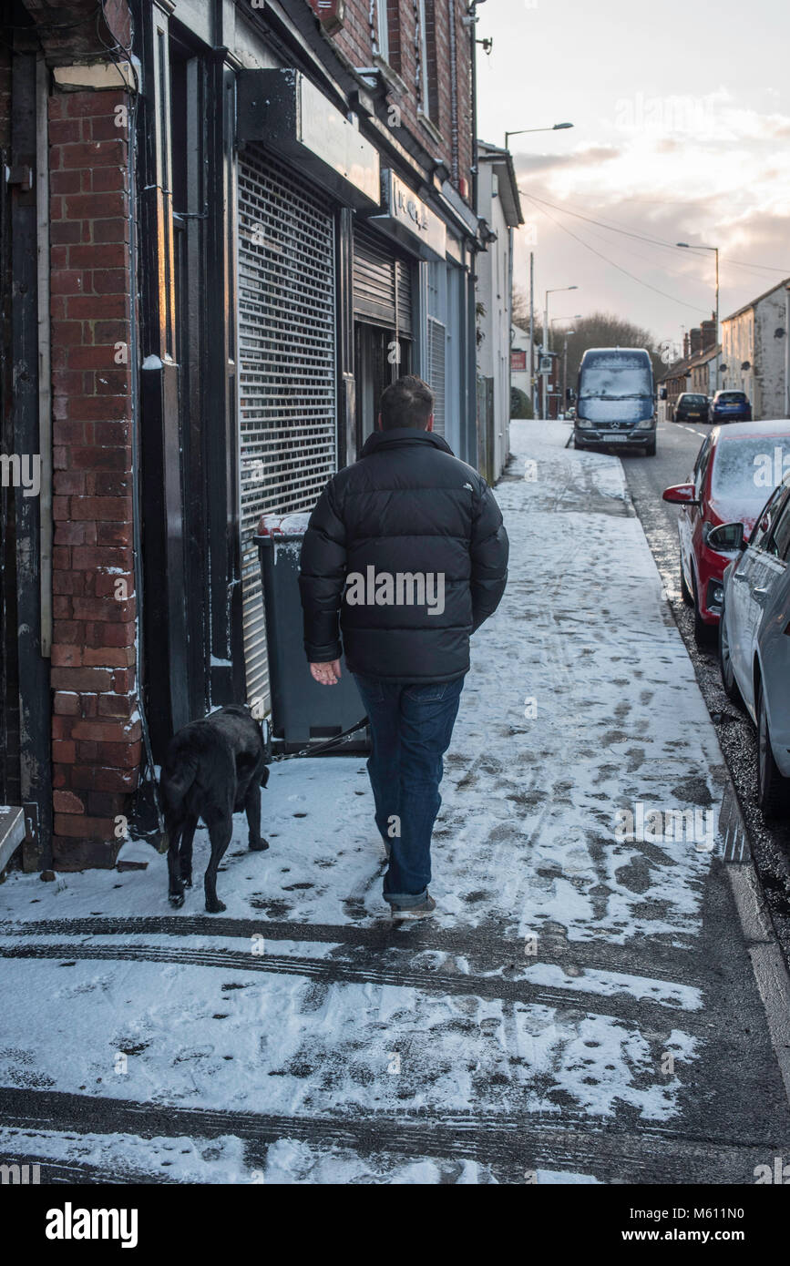 A sprinkling or dusting of snow in Telford, covering roofs and pathways ...