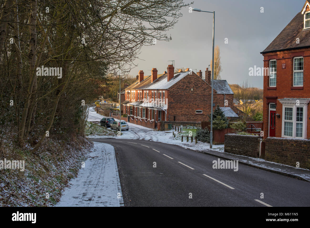 A sprinkling or dusting of snow in Telford, covering roofs and pathways ...
