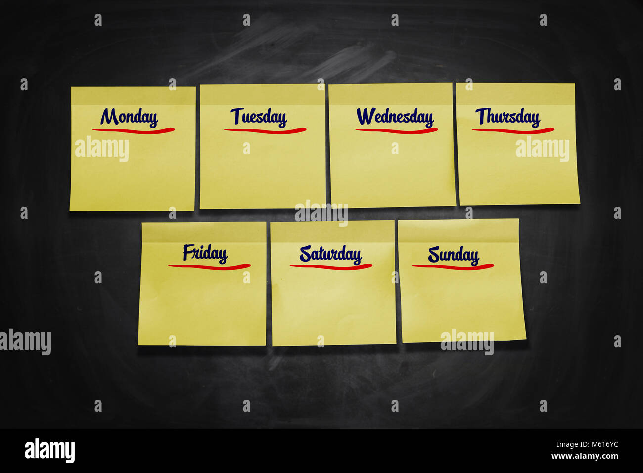 Days of Week Stick Notes on black board Stock Photo - Alamy