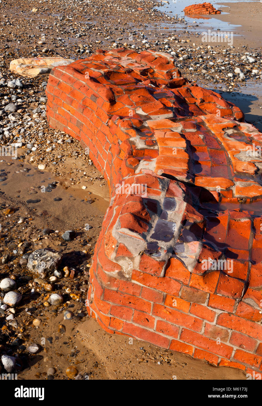 The remains of the Low Light Lighthouse on the beach at Happisburgh in ...