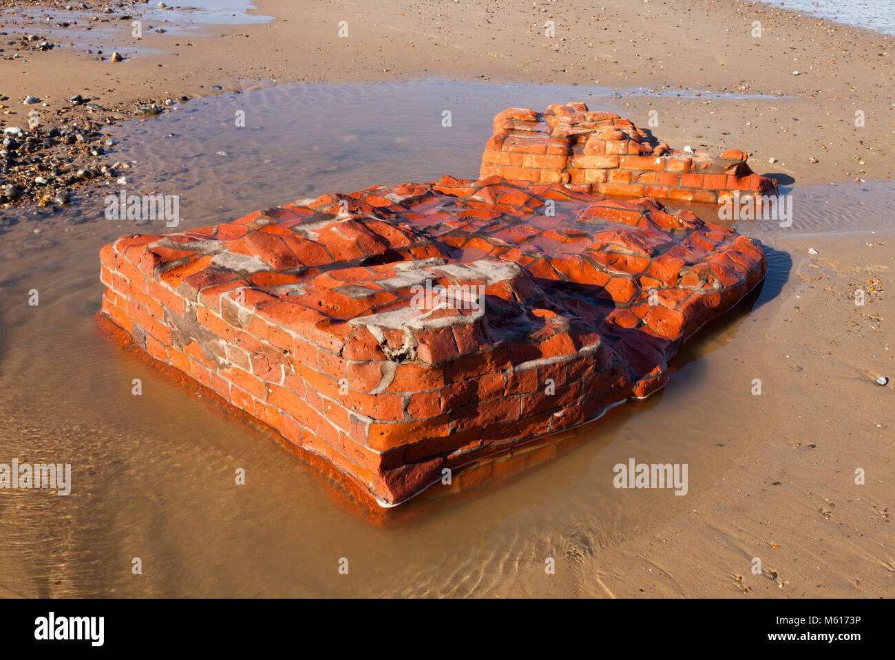 The remains of the Low Light Lighthouse on the beach at Happisburgh in ...