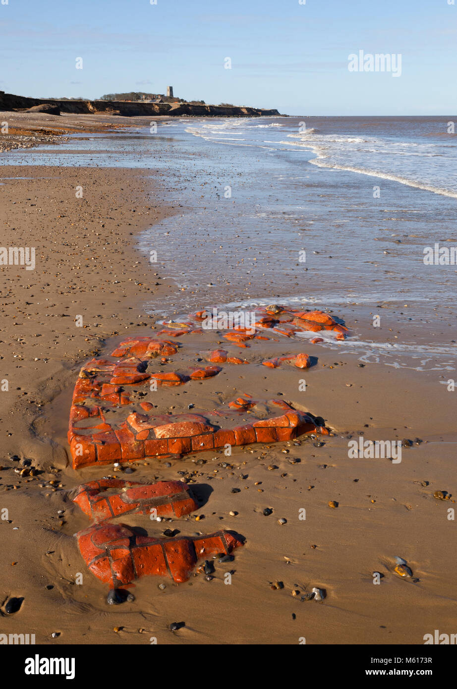 The remains of the Low Light Lighthouse on the beach at Happisburgh in ...