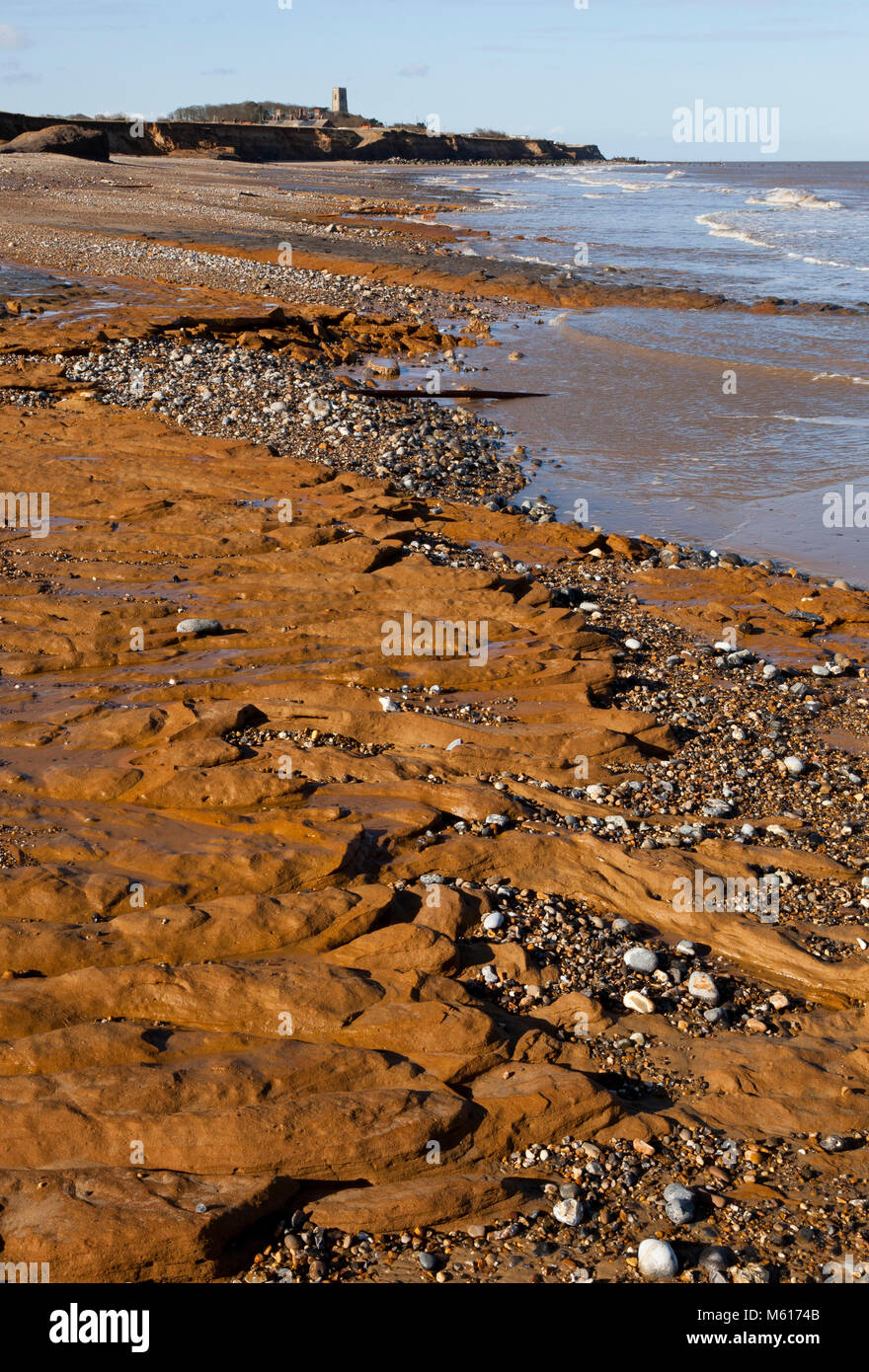 Exposed strata on the beach in winter at Happisburgh Beach in Norfolk ...