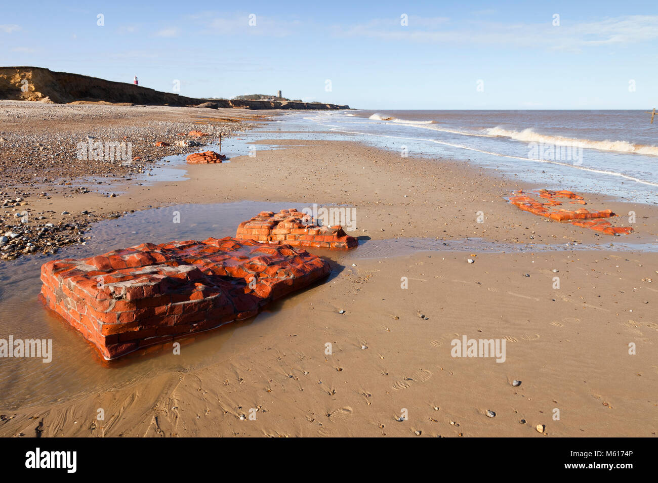 The remains of the Low Light Lighthouse on the beach at Happisburgh in ...
