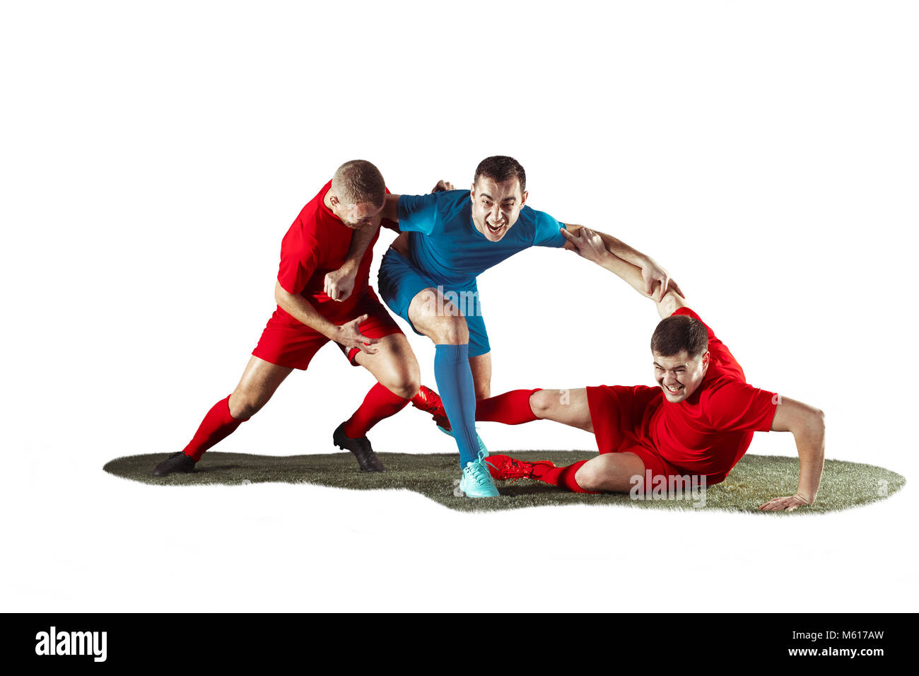 Football players tackling for the ball over white background Stock ...