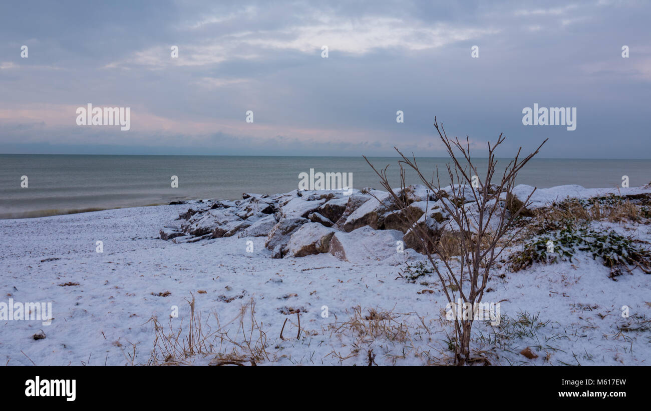 Snowy beach scene Stock Photo - Alamy