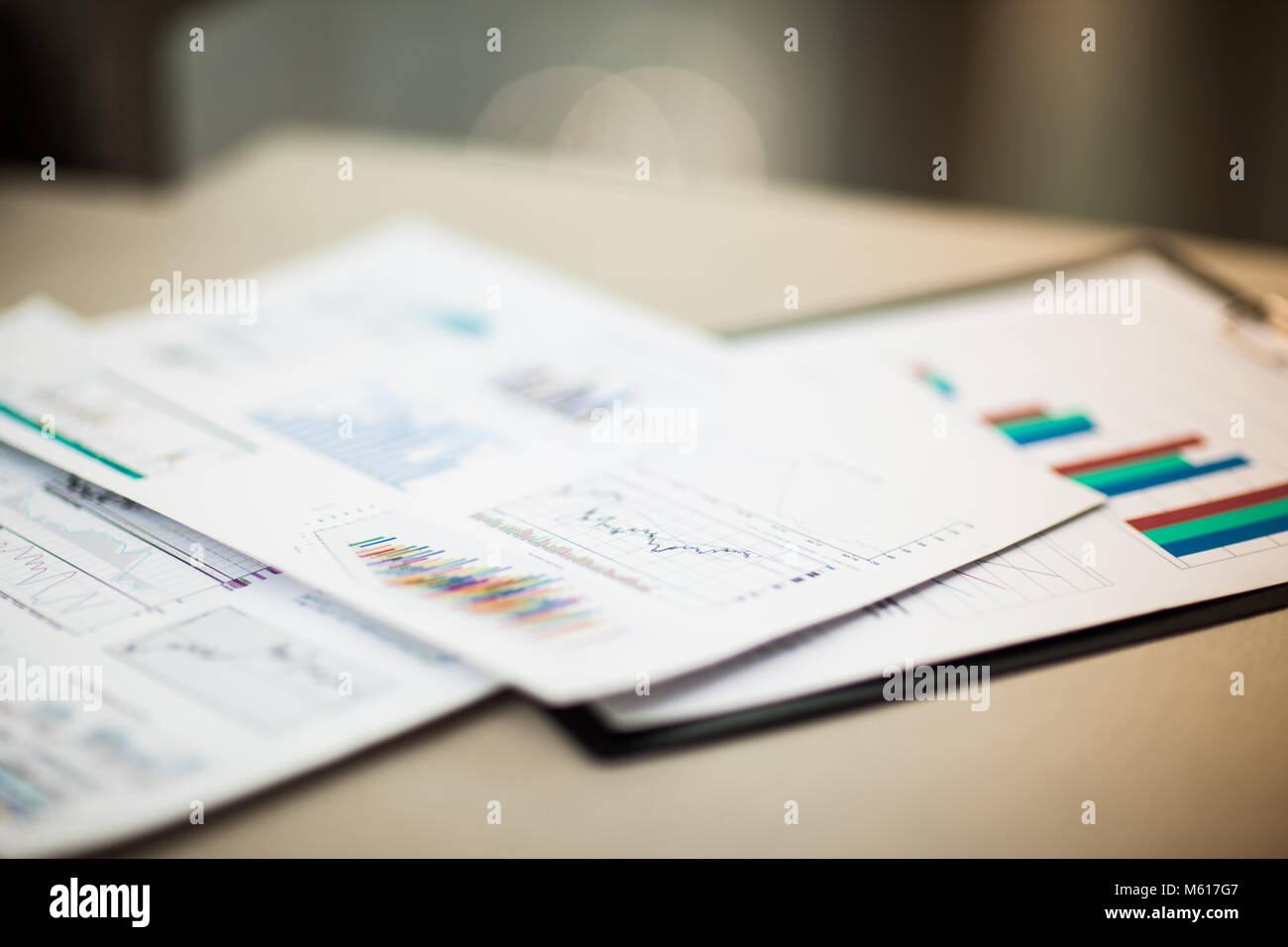 financial charts and graphs on the table Stock Photo - Alamy