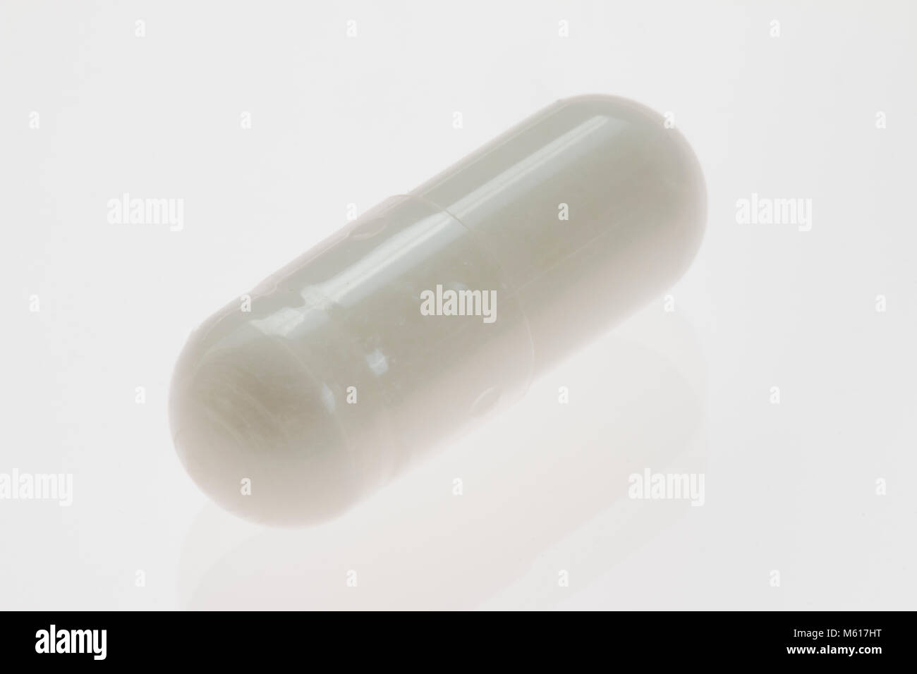 white capsule medicine for health isolated on white background Stock ...