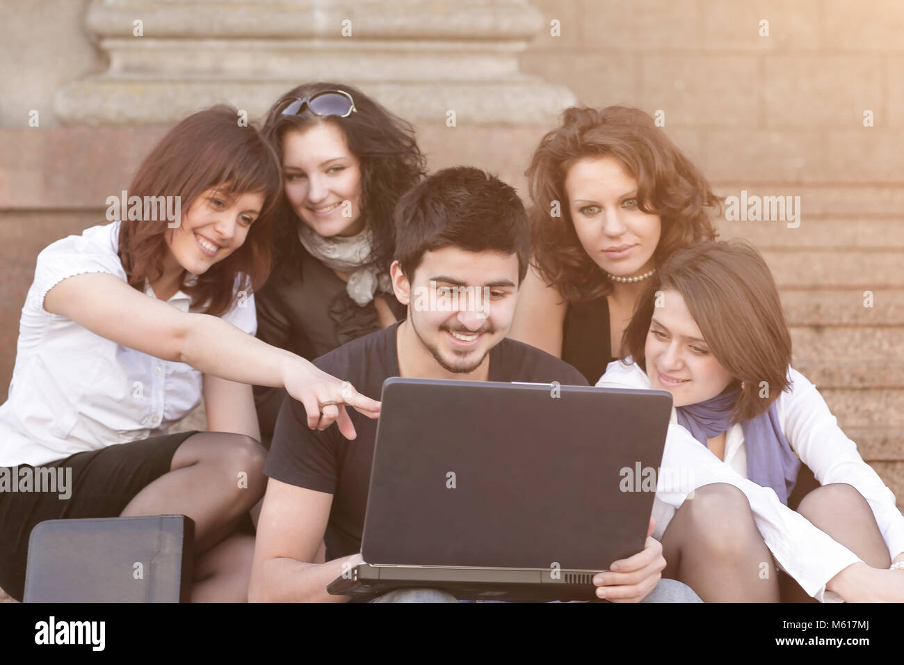 group of students discussing the information with the laptop Stock ...
