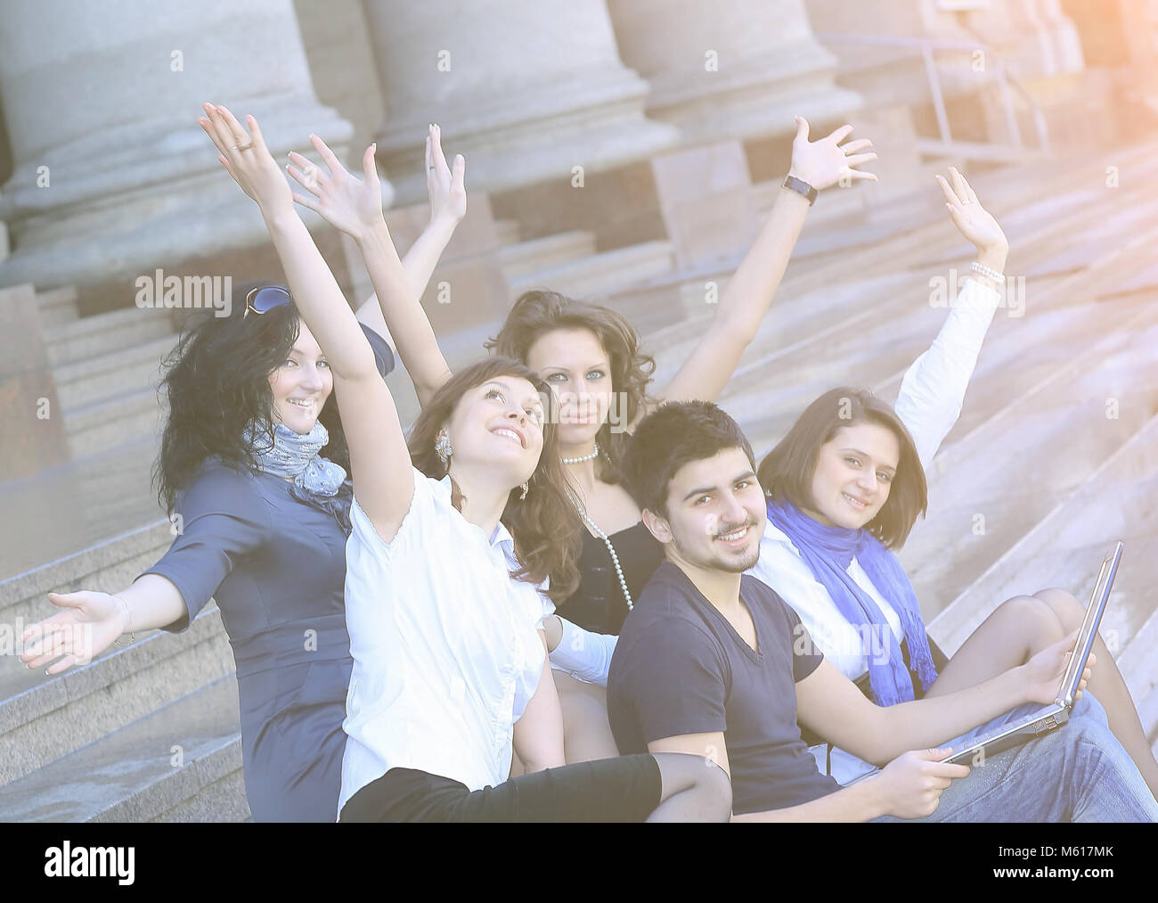 group of happy university students in front of university building ...