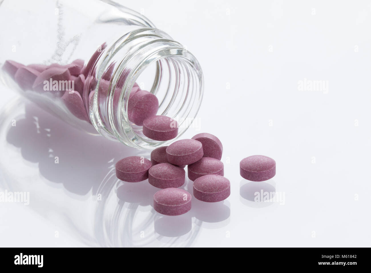 Purple pills hi-res stock photography and images - Alamy