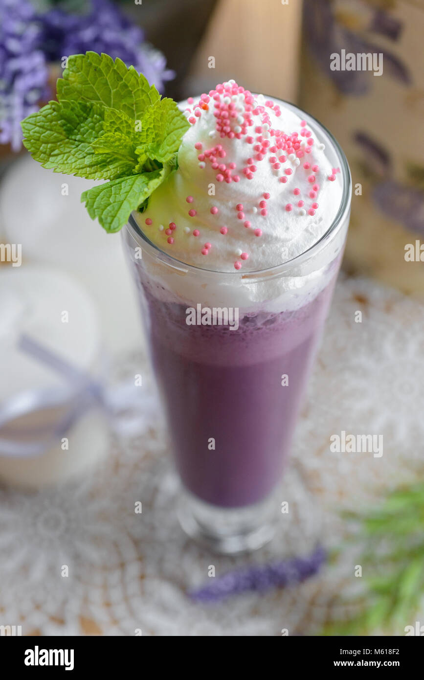 Cold sweet milkshake Stock Photo - Alamy