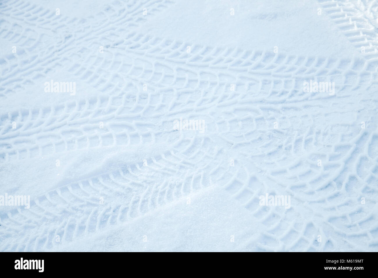 Car tyre tracks on snow hi-res stock photography and images - Alamy
