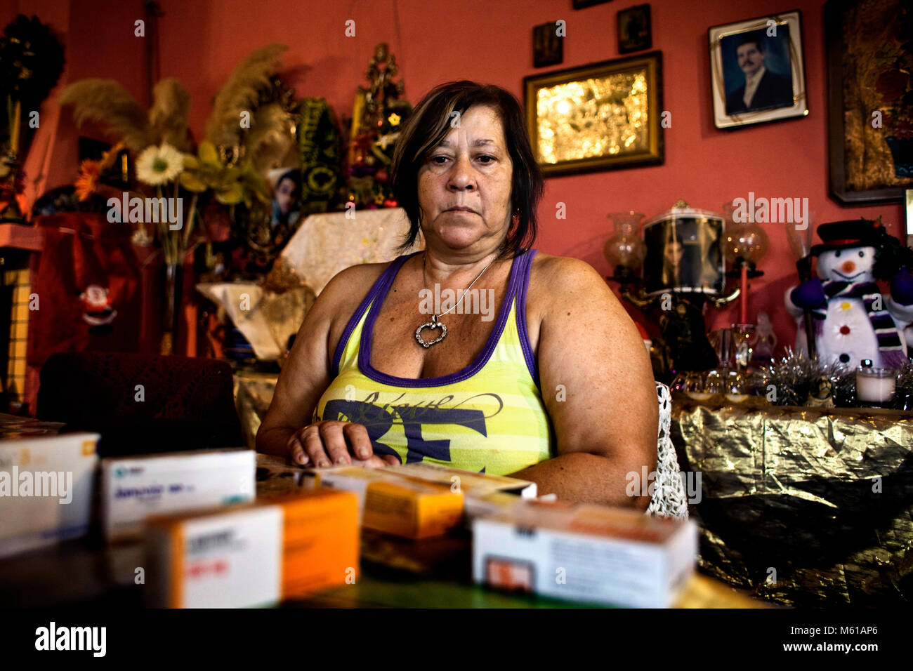 - 02/12/2012 - Athens - Eleni stares at all the medecine she has just ...