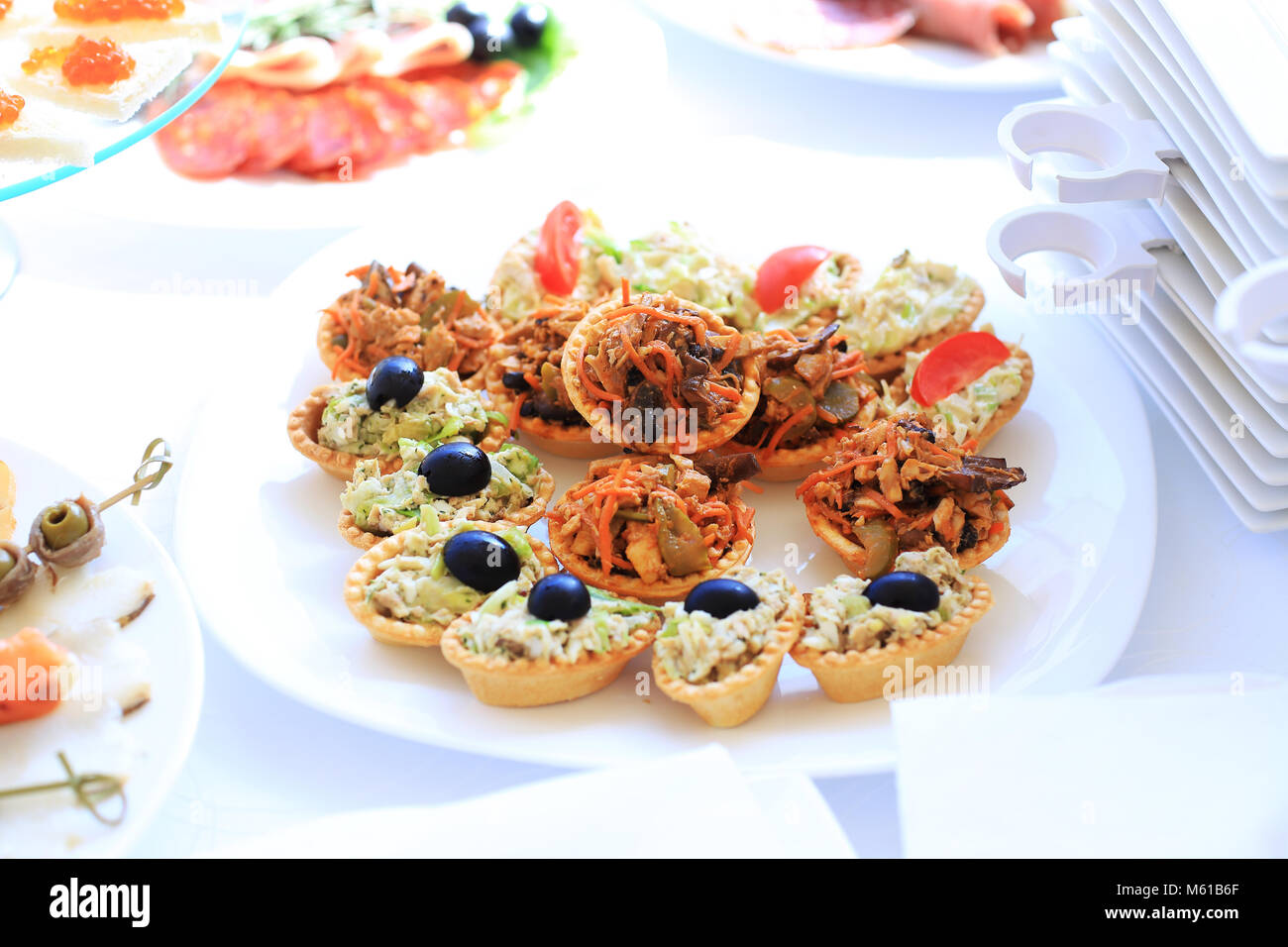 catering table set service with silverware and glass Stock Photo - Alamy