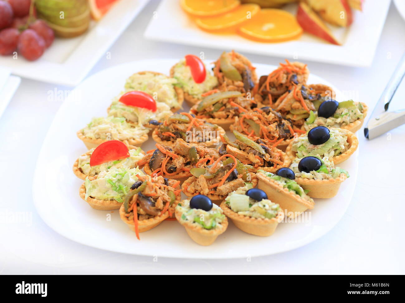catering table set service with silverware and glass Stock Photo - Alamy