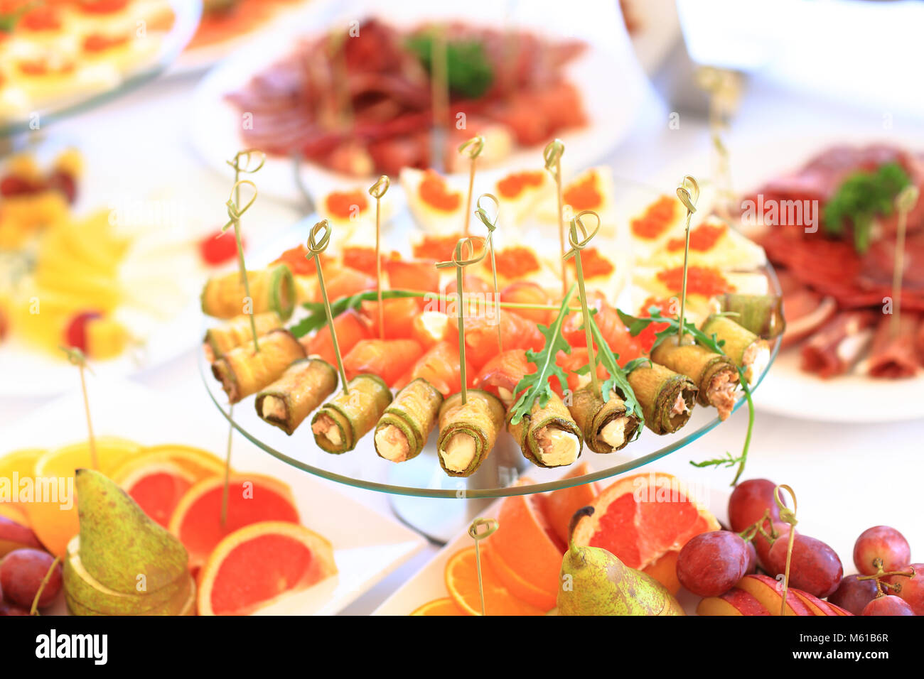 catering table set service with silverware and glass Stock Photo - Alamy