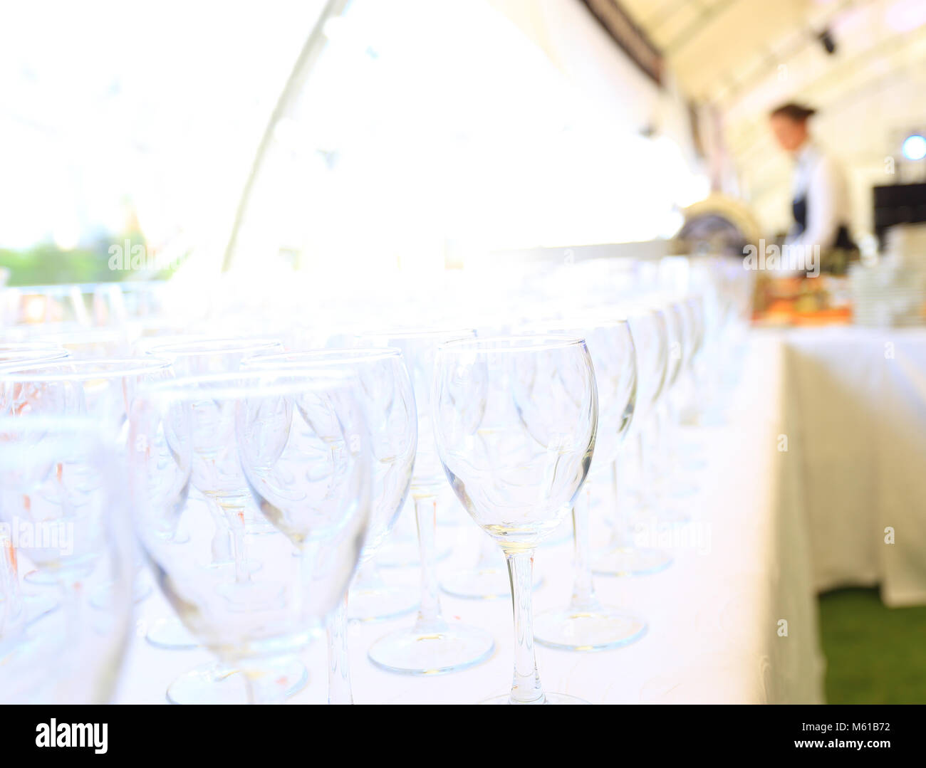 catering table set service with silverware and glass Stock Photo - Alamy