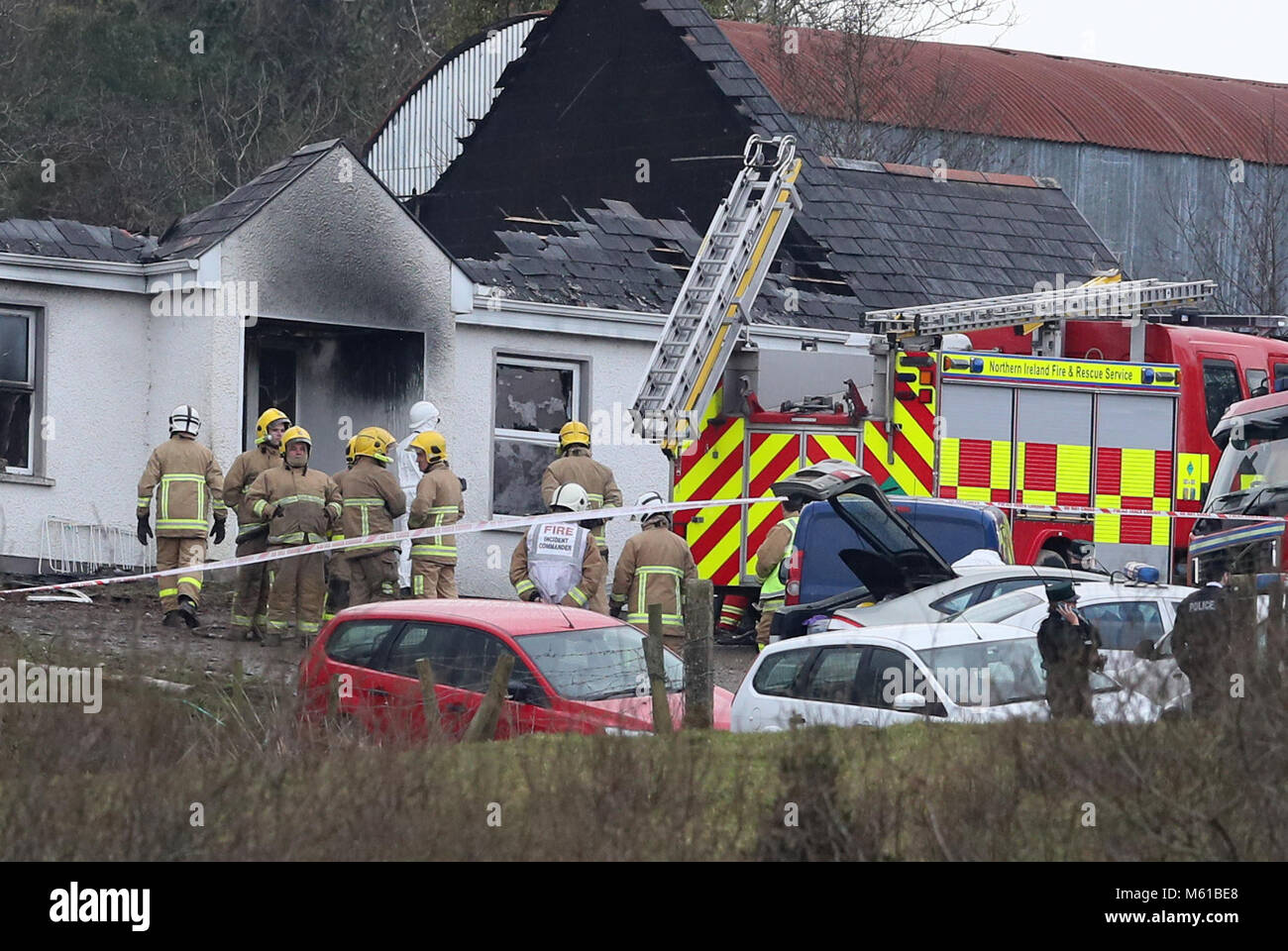 Forensic and fire officers at a house in Derrylin, Fermanagh where ...