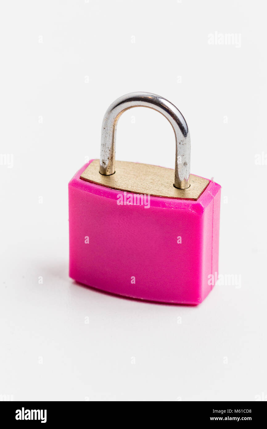 Pink luggage lock on white background Stock Photo - Alamy