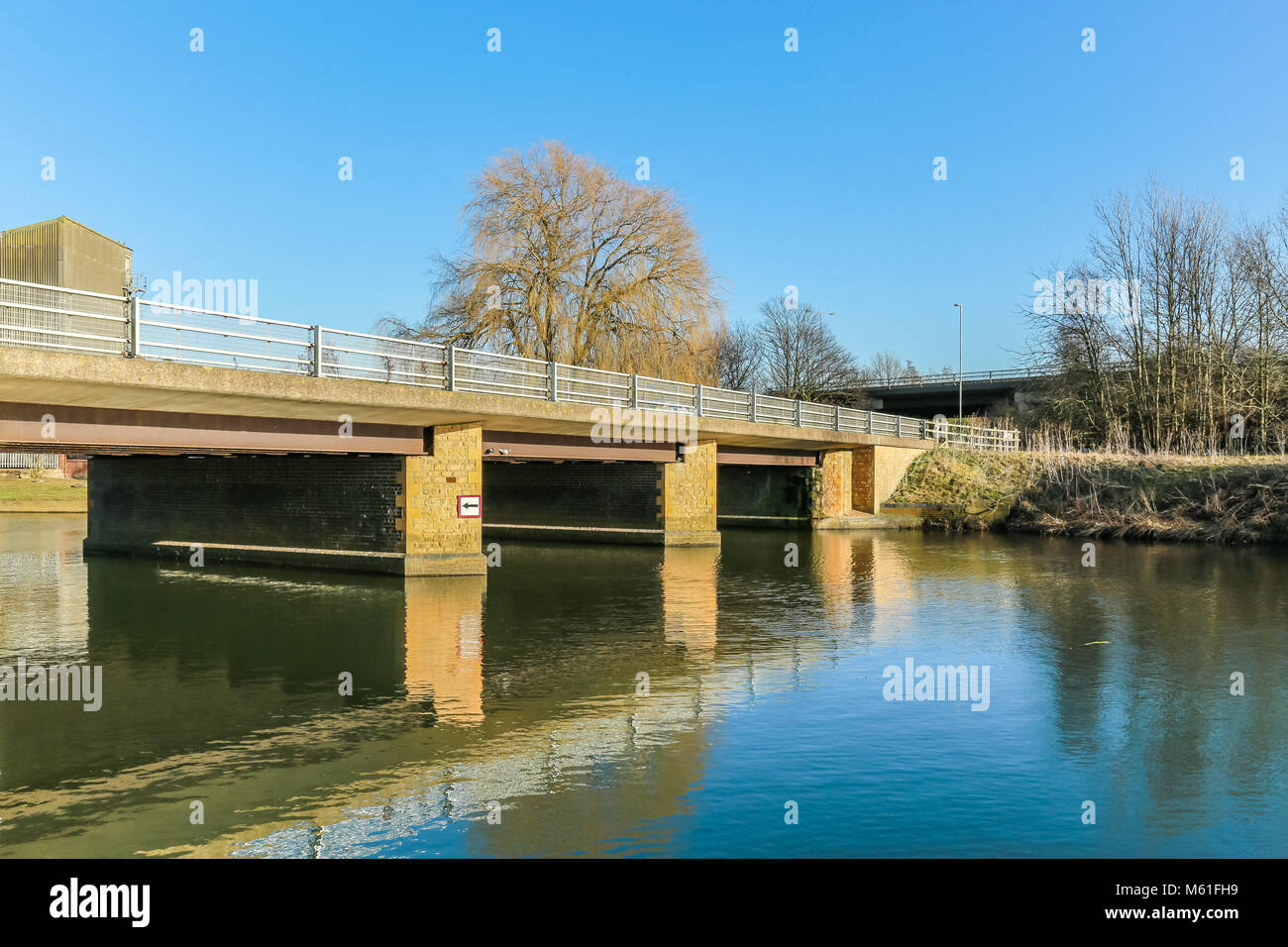 A bridge on the river Nene showing the navigation channel Stock Photo ...