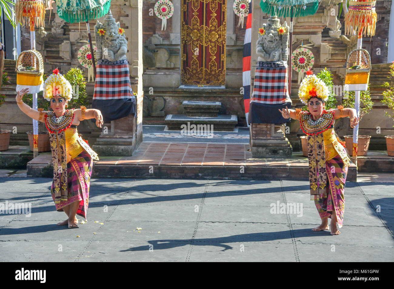 Balinese locals performing Barong, a mythical lion-like creature at a ...